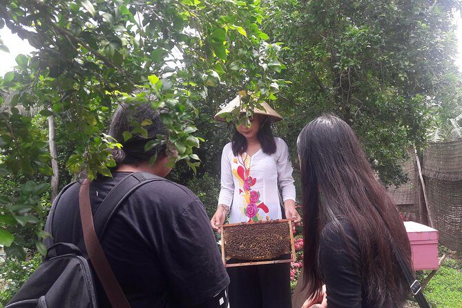 1-day Mekong Delta Tour: Cai Be Market, Local Island and Cycling - Scenic Cycling & Local Interaction