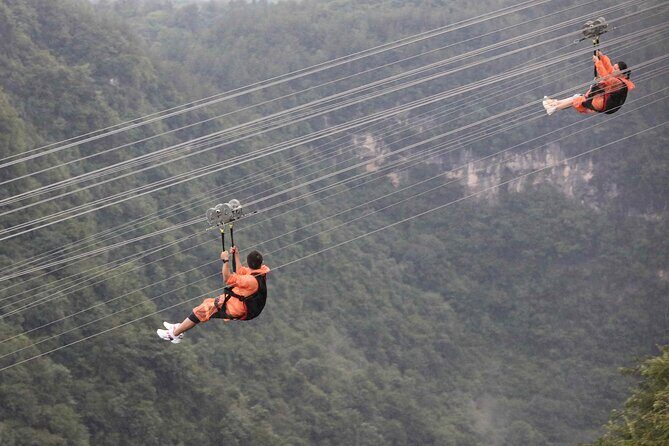 1-Day Private Tour to Glass Bridge & Yellow Dragon Cave - Overview of the Tour Experience