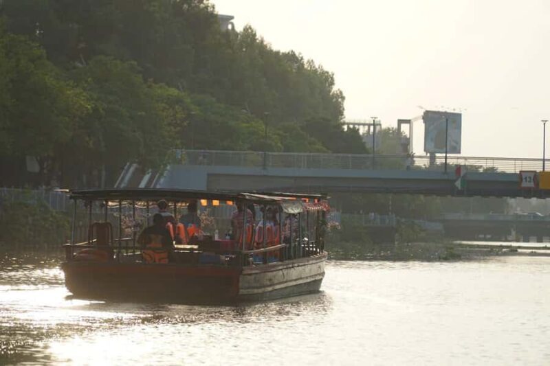 1 hour Nhieu Loc boat tour experience: A historic canal - The Guide and Narration