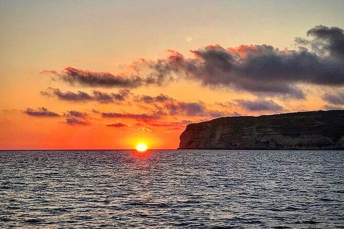 3-Hour Dolphin watching at sunset with aperitif - The Sum Up