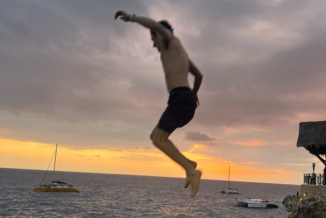 7 Mile Beach Party Catamaran Cruise with Snorkeling & Ricks Cafe - What to Expect from the Tour