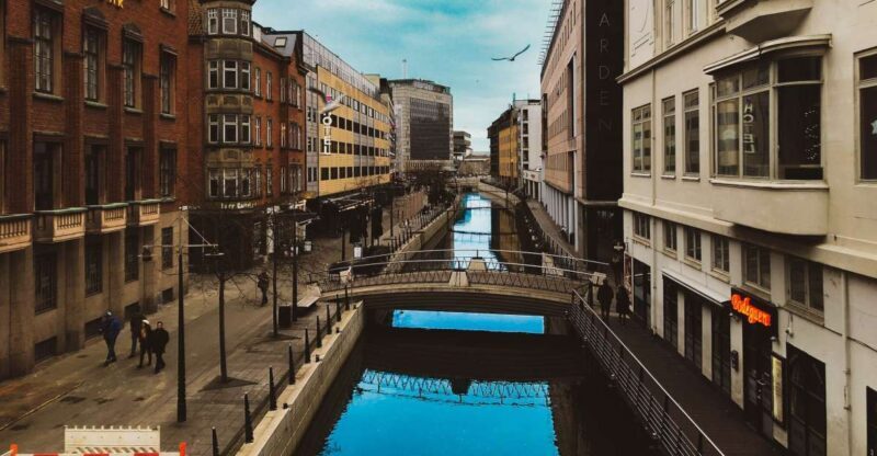 Aarhus: Surprise City Walking Tour with Local Guide - Art at the Skovgaardsgade Bus Station