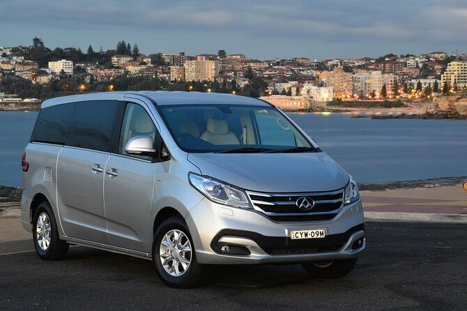 AIRPORT TRANSFER between Cairns Airport & Port Douglas (6am-5pm) - The Sum Up