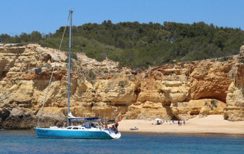 Albufeira: Sailing Boat Cruise BBQ & Open Bar on the Beach - In The Sum Up