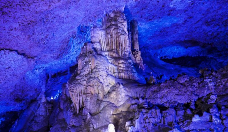 Alcudia: Half-day Caves of Hams, Blue Caves and documentary - Guided Insights and Historical Context