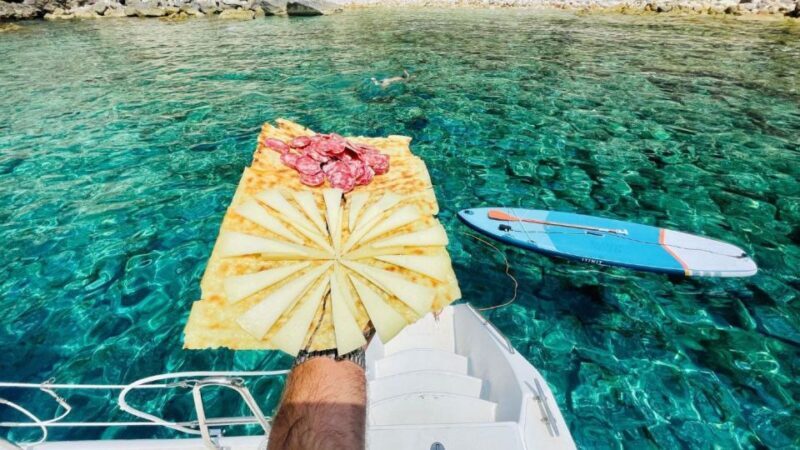 Alghero: Full day on a catamaran in Porto Conte Natural Park - What to Expect on the Full-Day Catamaran Tour