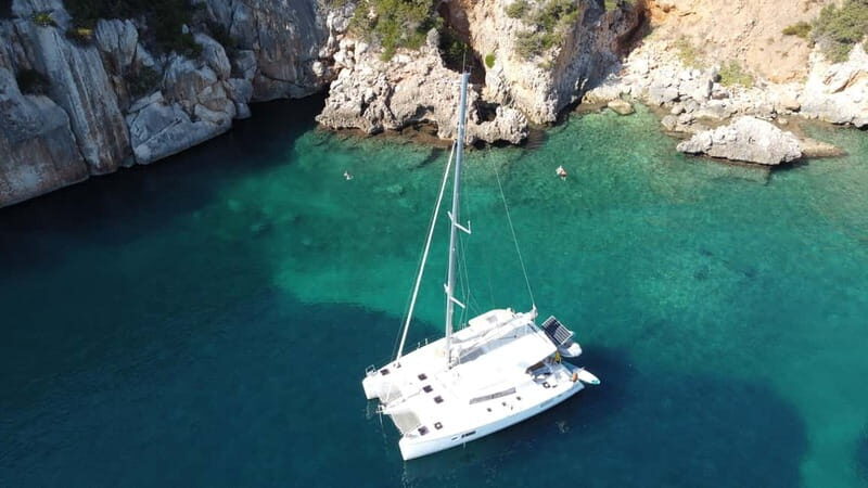 Alghero: Sailing catamaran day trip with lunch - The Itinerary: What You Can Expect