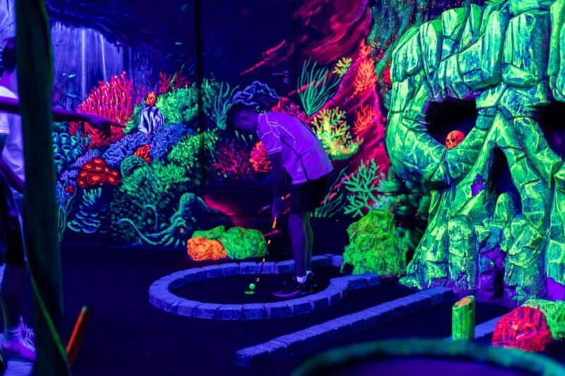 Aloha Amsterdam: 12-Hole Glow-in-the-Dark Mini-Golf - Key Points