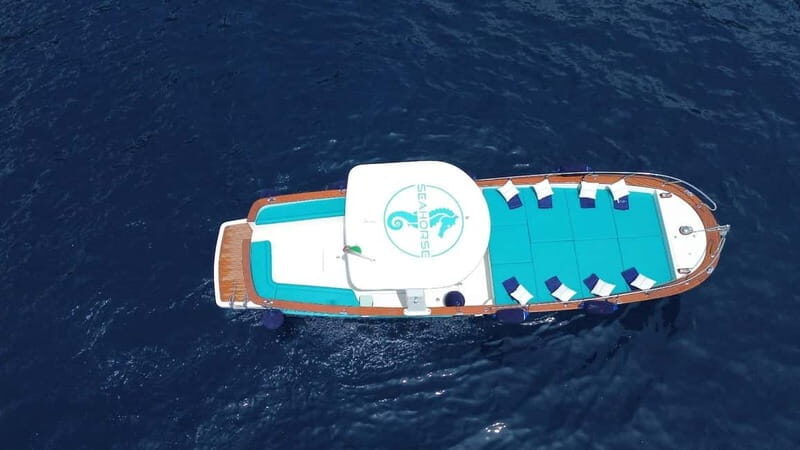 Amalfi: Sunset Cruise Swimm Caves Beaches Positano Prosecco - The Charm of Praiano & Sunset Views