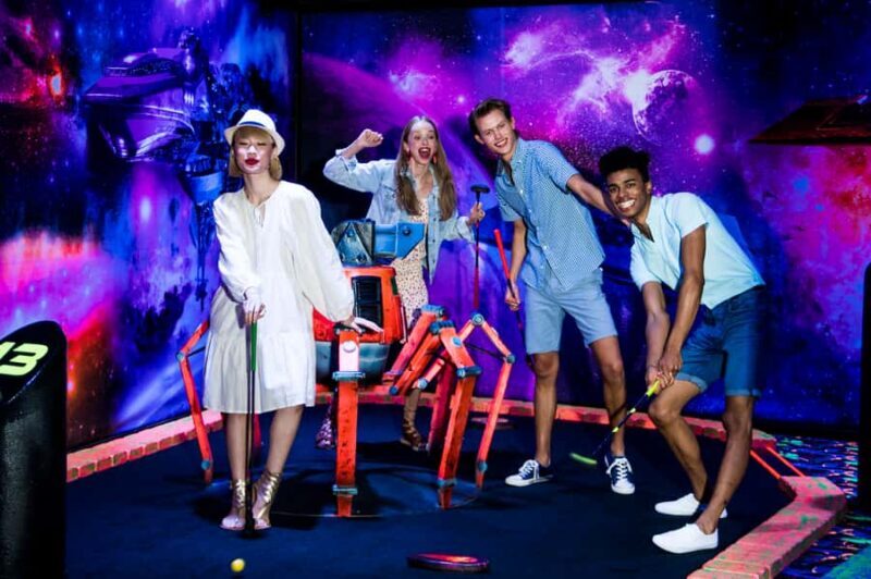 American Dream: Blacklight Mini Golf Entry Ticket - Key Points