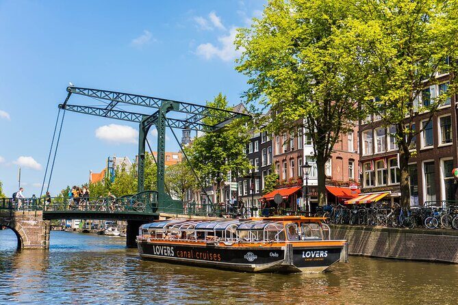 Amsterdam 1h Canal Cruise by Semi-Open Boat with Audio Guide - Key Points