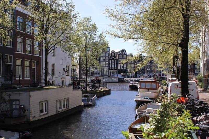 Amsterdam: 2-hour History & Culture tour with a Local - Authentic Local Insights and Hidden Gems