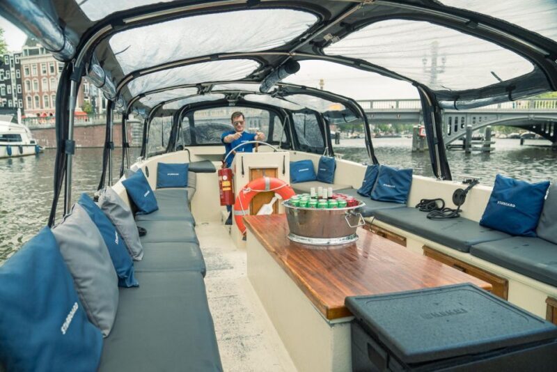 Amsterdam: Cozy Evening Canal Cruise With Open Bar Option - The Tour Itinerary in Depth