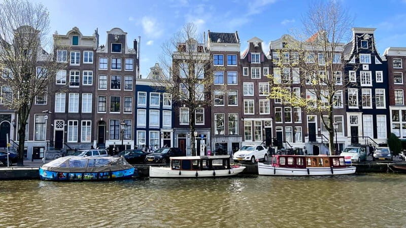 Amsterdam Daytime Boat Private Canal Cruise Tour With Guide - The Sum Up