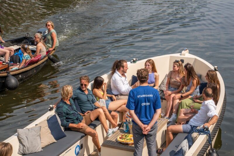 Amsterdam: German Guided Canal Cruise with on Board Bar - Key Points