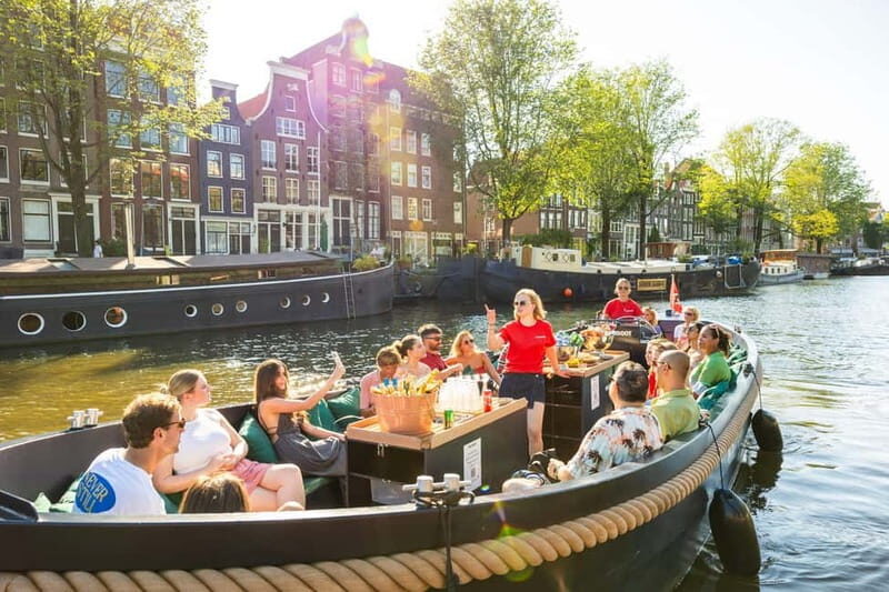 Amsterdam: Guided Open Boat Canal Cruise Including Drink - Why Choose This Canal Cruise?
