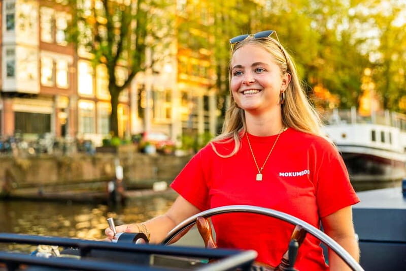 Amsterdam: Guided Open Boat Canal Cruise Including Drink - FAQ