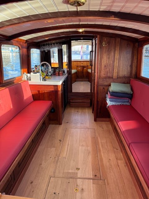 Amsterdam: Historic Boat Cruise with open bar and nibbles - An Authentic Canal Experience on a Historic Vessel