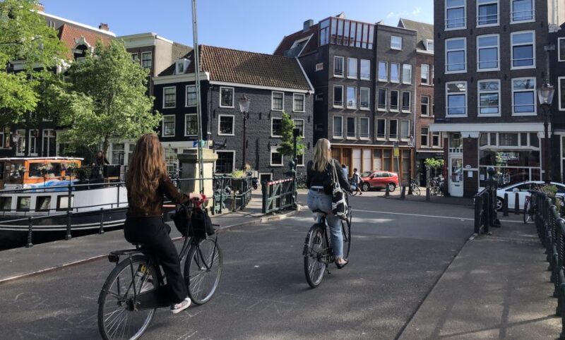 Amsterdam: Inner City Bike Tour German or English (Private) - Authentic Experiences and Travel Tips