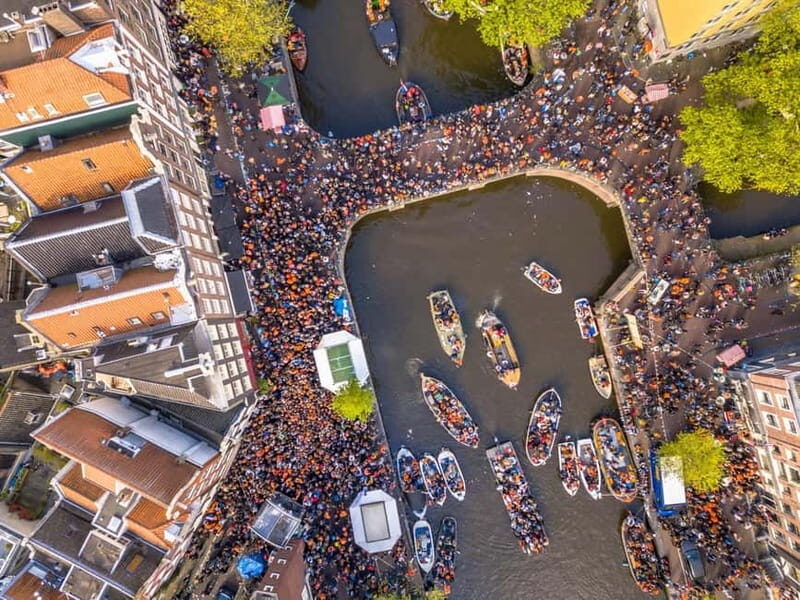 Amsterdam: Kings Day Boat Party with Unlimited Drinks - Key Points