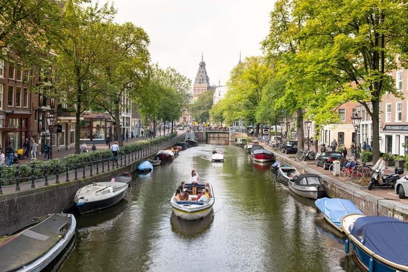 Amsterdam: Open Boat Canal Cruise (with Free Spritz Option) - Authenticity and Traveler Feedback
