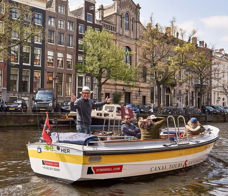 Amsterdam: Open Boat Tour of Canals with Expert Local Guide - How the Tour Feels in Practice