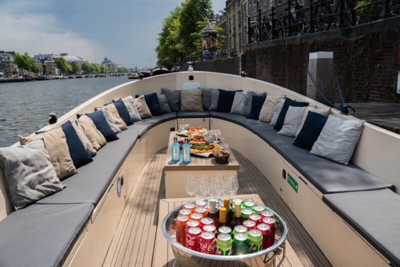 Amsterdam: Private Canal Booze Cruise with Unlimited Drinks - A Closer Look at the Experience