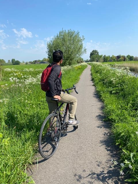 Amsterdam: Road Bike Rental with Self Guided Tour - Key Points