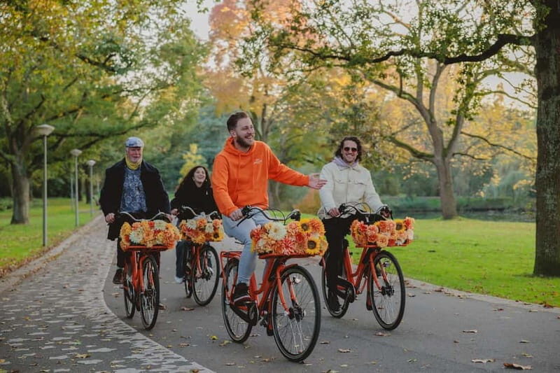Amsterdam: Top Highlights Guided Bike Tour EN/DE/ES/FR/IT/CN - The Experience: What to Expect from the Tour