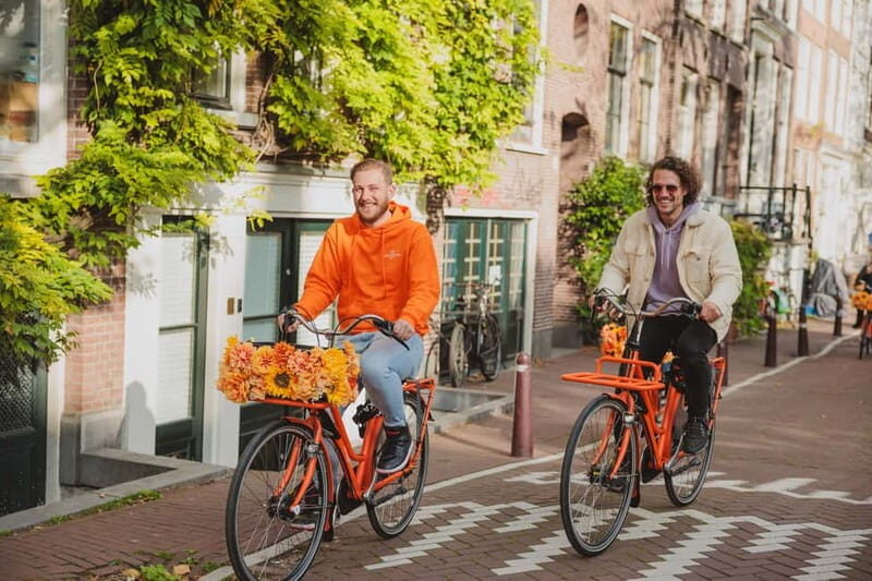 Amsterdam: Top Highlights Guided Bike Tour EN/DE/ES/FR/IT/CN - The Practical Side: Group Size, Accessibility, and Tips