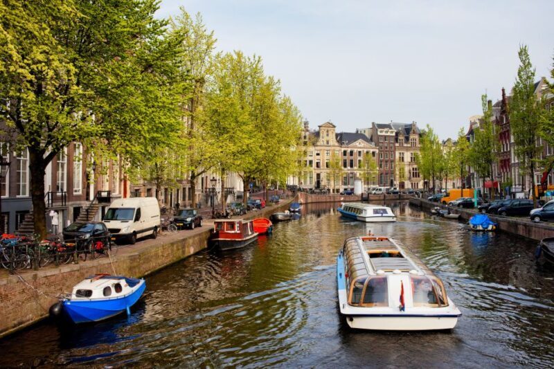 Amsterdam Walking Tour and Canal Cruise - What Visitors Love Most