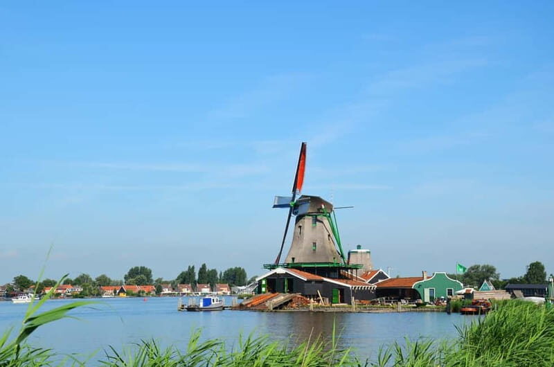 Amsterdam: Zaanse Schans windmills & Volendam Guided Tour - Key Points