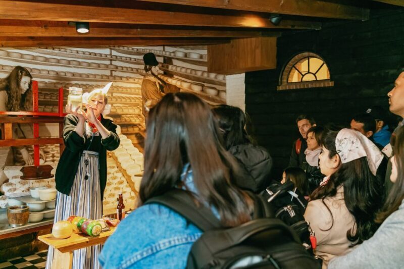Amsterdam: Zaanse Schans windmills & Volendam Guided Tour - Volendam: A Picturesque Fishing Village
