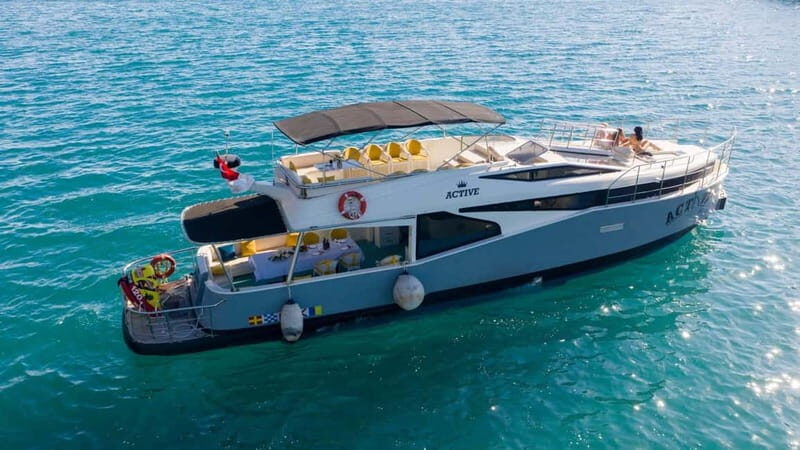 Antalya Transfer with Kleopatra Beach Stop Deluxe Yacht Tour - Key Points