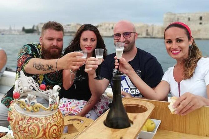 Aperitif on the boat at Sunset island and sea caves - A Glimpse into Sicily’s Sea Caves and Sunset Aperitif Experience