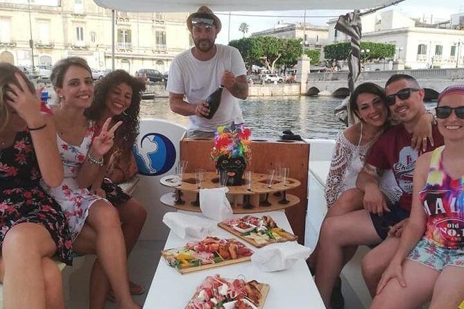 Aperitif on the boat at Sunset island and sea caves - Who Will Love This Experience?