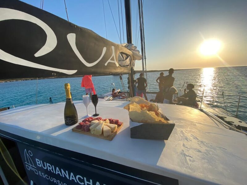aperitifs at sunset on the Stintino catamaran burianaCharter - An In-Depth Look at the Stintino Sunset Aperitif by BurianaCharter