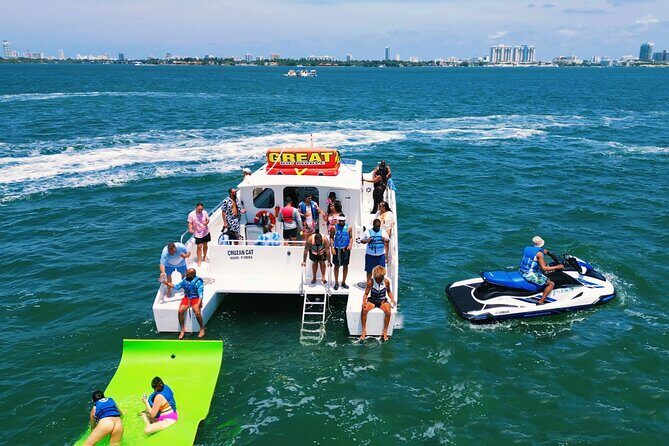 Aquatic Adventure: Boat Tour with Jetskis, Tubing, and Open Bar - Key Points