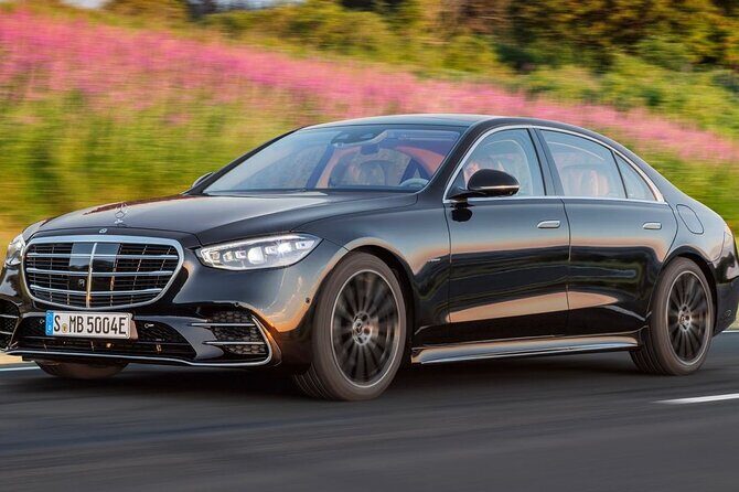 Arrival by Luxury Car from Heathrow Airport LHR to Central London - The Sum Up