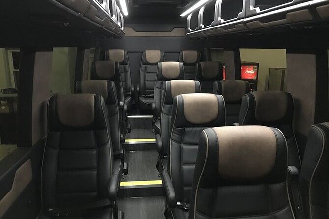 Arrival Private Transfer from MAD Airport to Madrid in a Minibus - The Sum Up