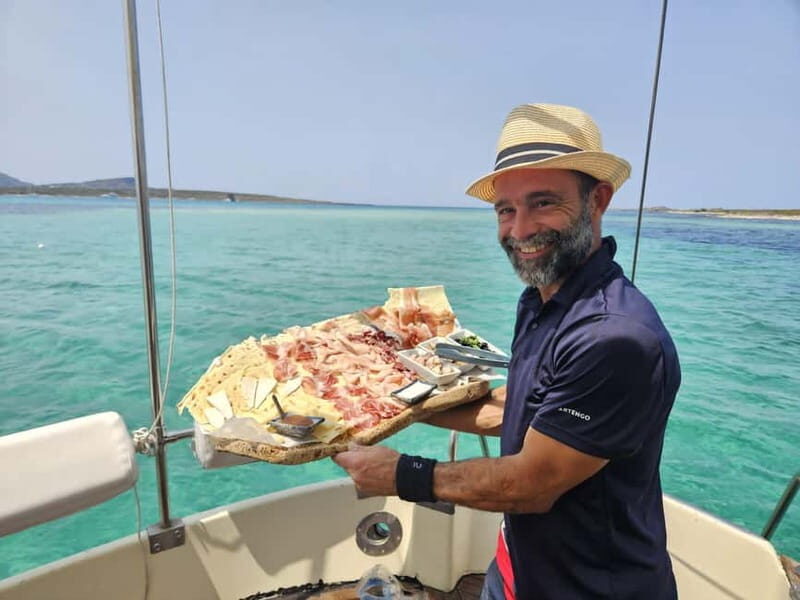 ASINARA: motorboat tour of the island park, aperitif, lunch on board. - A Complete Guide to the Asinara Island Motorboat Tour: Sardinian Flavors and Stunning Views