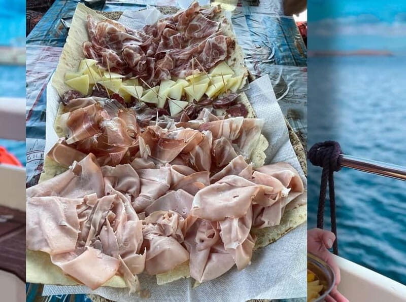 ASINARA: motorboat tour of the island park, aperitif, lunch on board. - The Sum Up: An Authentic Slice of Sardinia