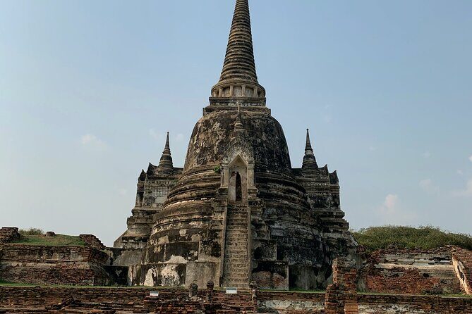 Ayutthaya Sunset Boat Ride & Famous Attraction From Bangkok - Key Points