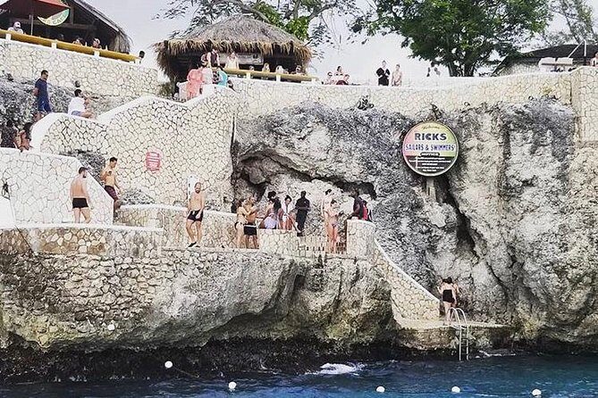 Bamboo Rafting and Limestone Foot Massage with Ricks Cafe Private Tour - The Sum Up