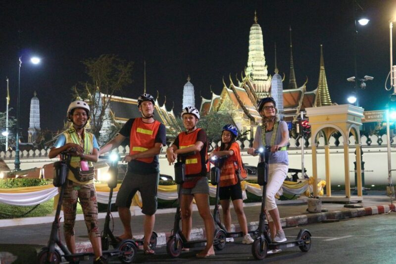 Bangkok: E-Scooter Night Tour with Local Street Food - Temples and River Views
