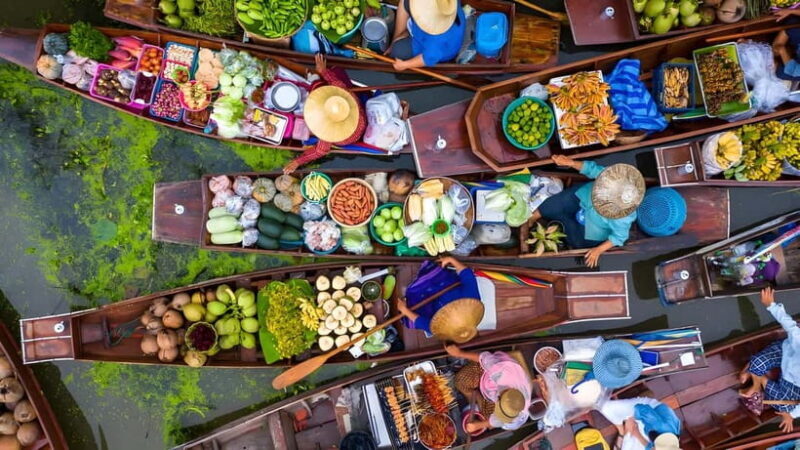 Bangkok: Railway, Floating Market & Chao Phraya Cruise Tour - The Maeklong Railway Market: A One-of-a-Kind Spectacle