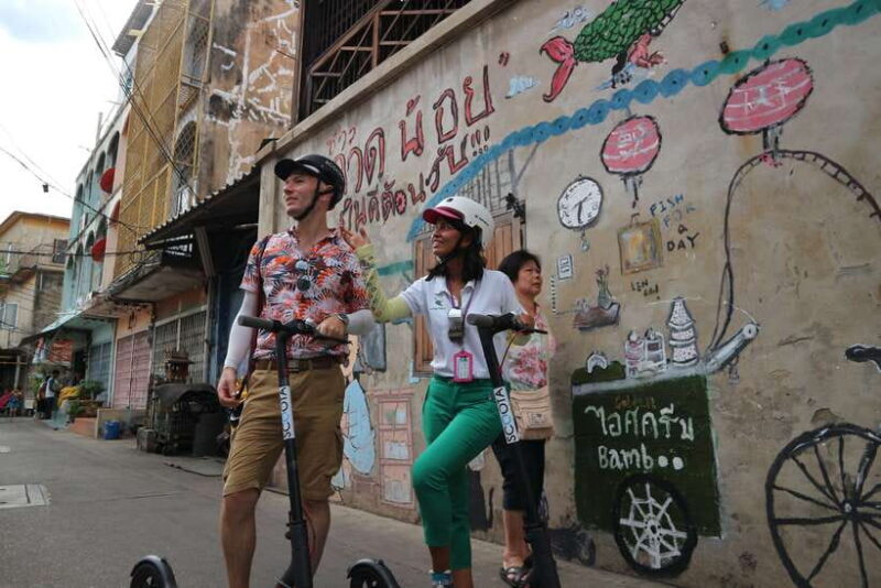 Bangkok: Riverside E-Scooter Adventure with StreetFood Snack - Who Should Consider This Tour?