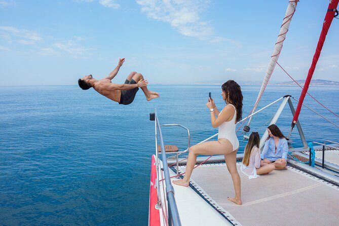 Barcelona Catamaran Cruise with Tapa & Drink Included - Key Points