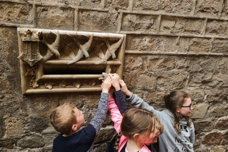 Barcelona: Churros, Hot Chocolate, and Games Family Tour - Key Points