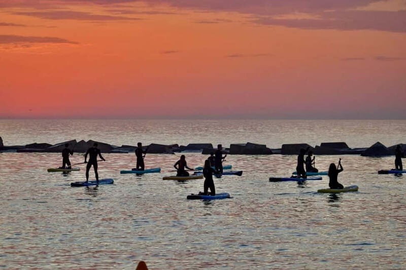 Barcelona: Paddleboard at sunrise. Inc.: teacher, photos/videos, material, equipment. - An In-Depth Look at the Sunrise Paddleboard Experience in Barcelona